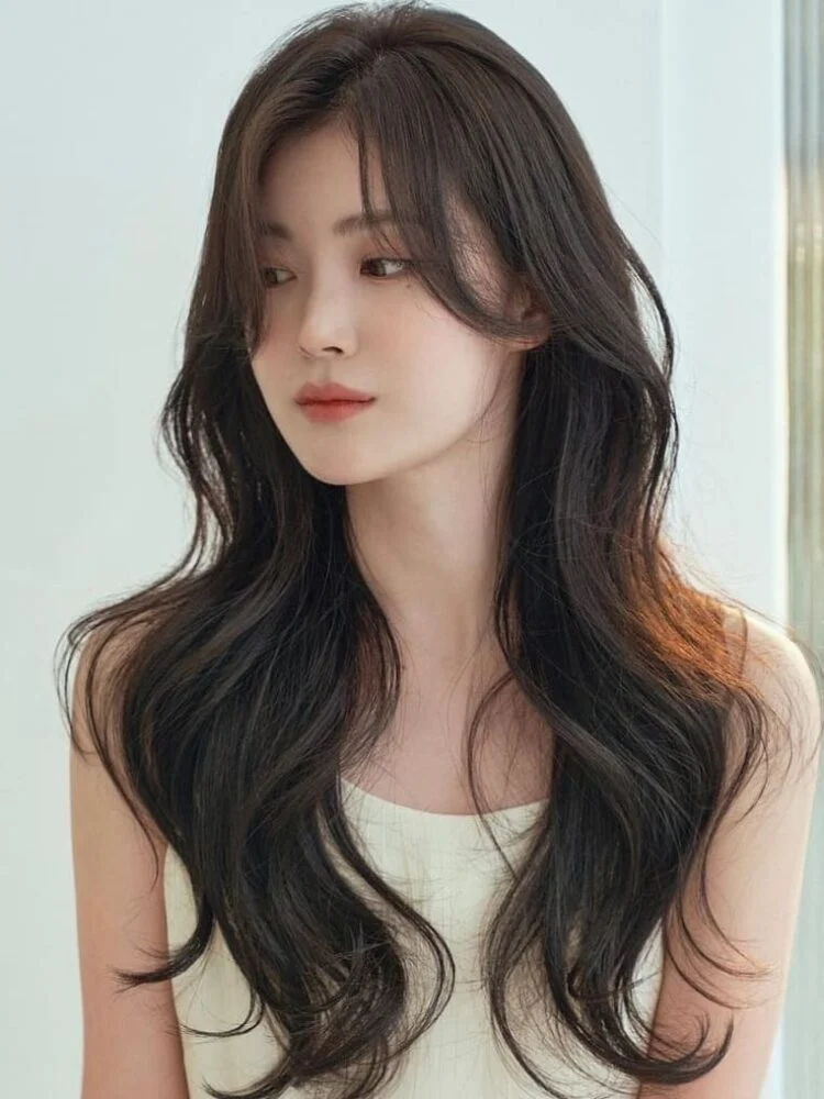 These Bangs and Layers Looks Make Hair Look Twice as Full
